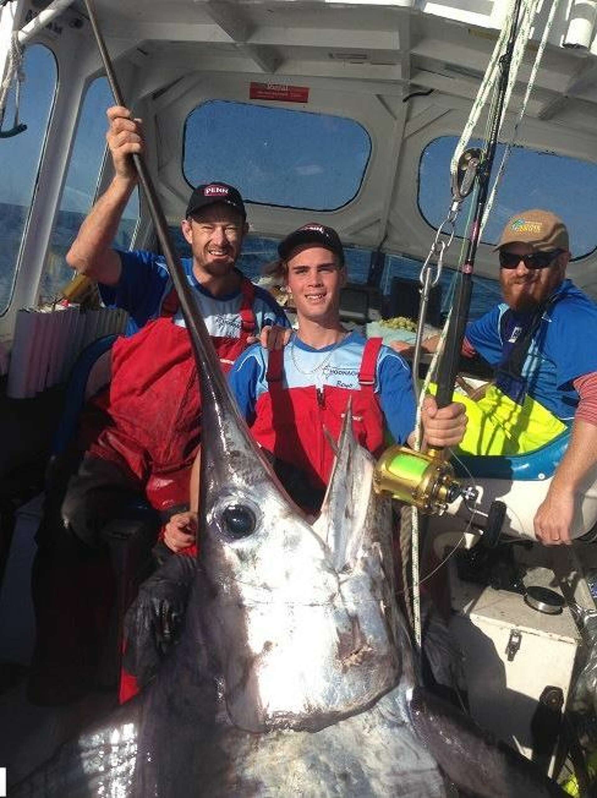 Texas man catches two 7-foot sharks in one day