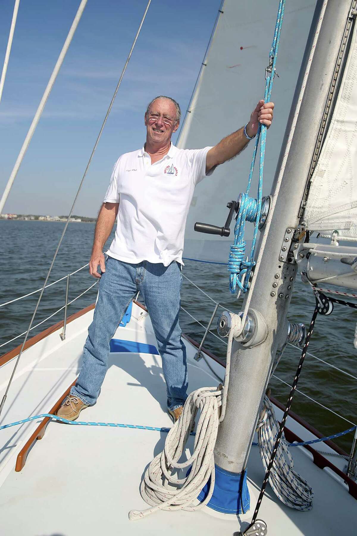 Dave McCabe takes children and veterans out on the water to work a ...