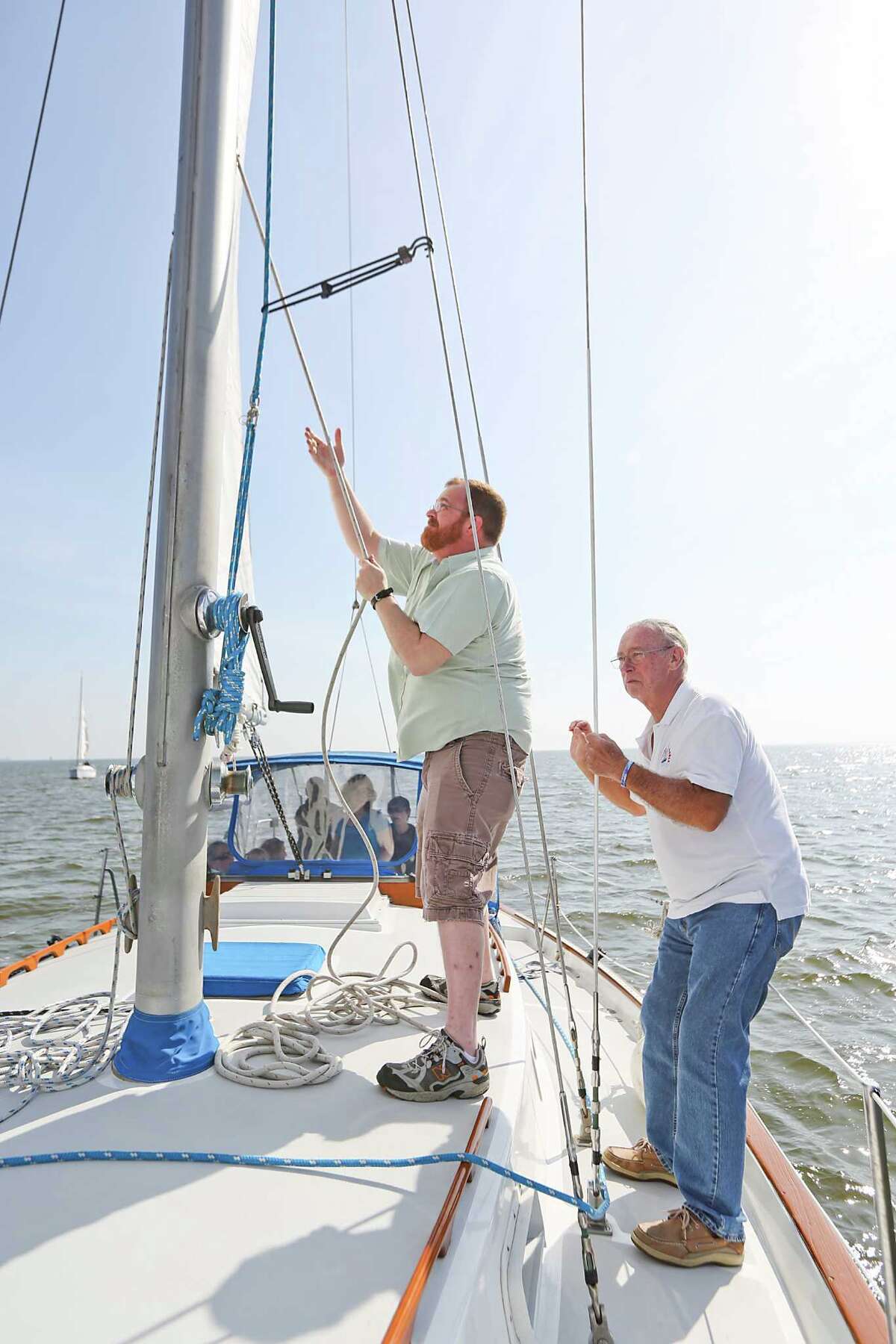 Dave McCabe takes children and veterans out on the water to work a ...