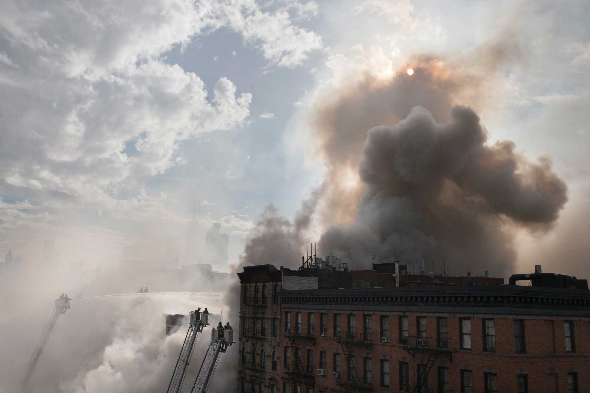 New York fire, building collapse injure 12; gas blast blamed