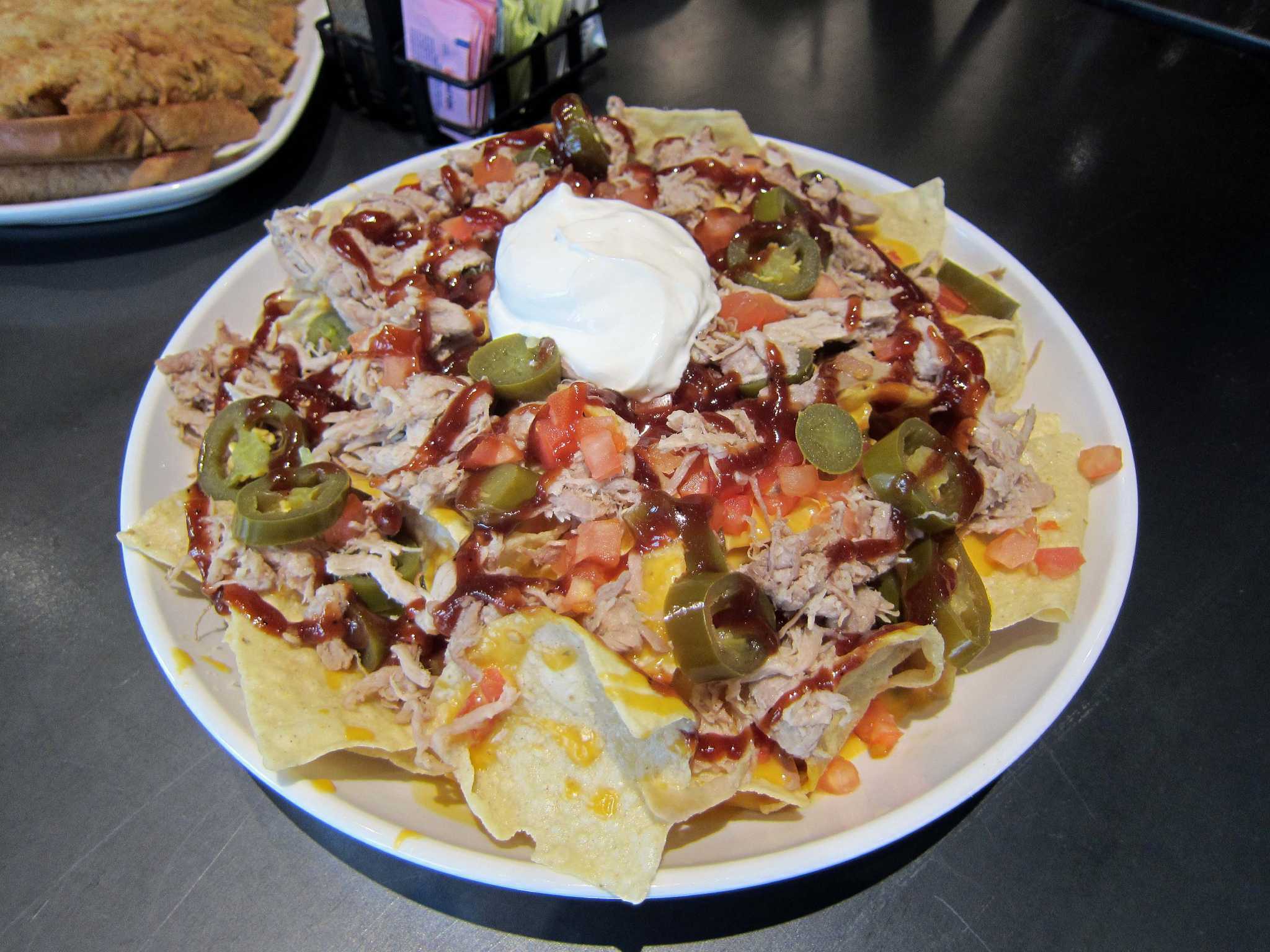 One great dish: Pulled pork nachos at Bombshells