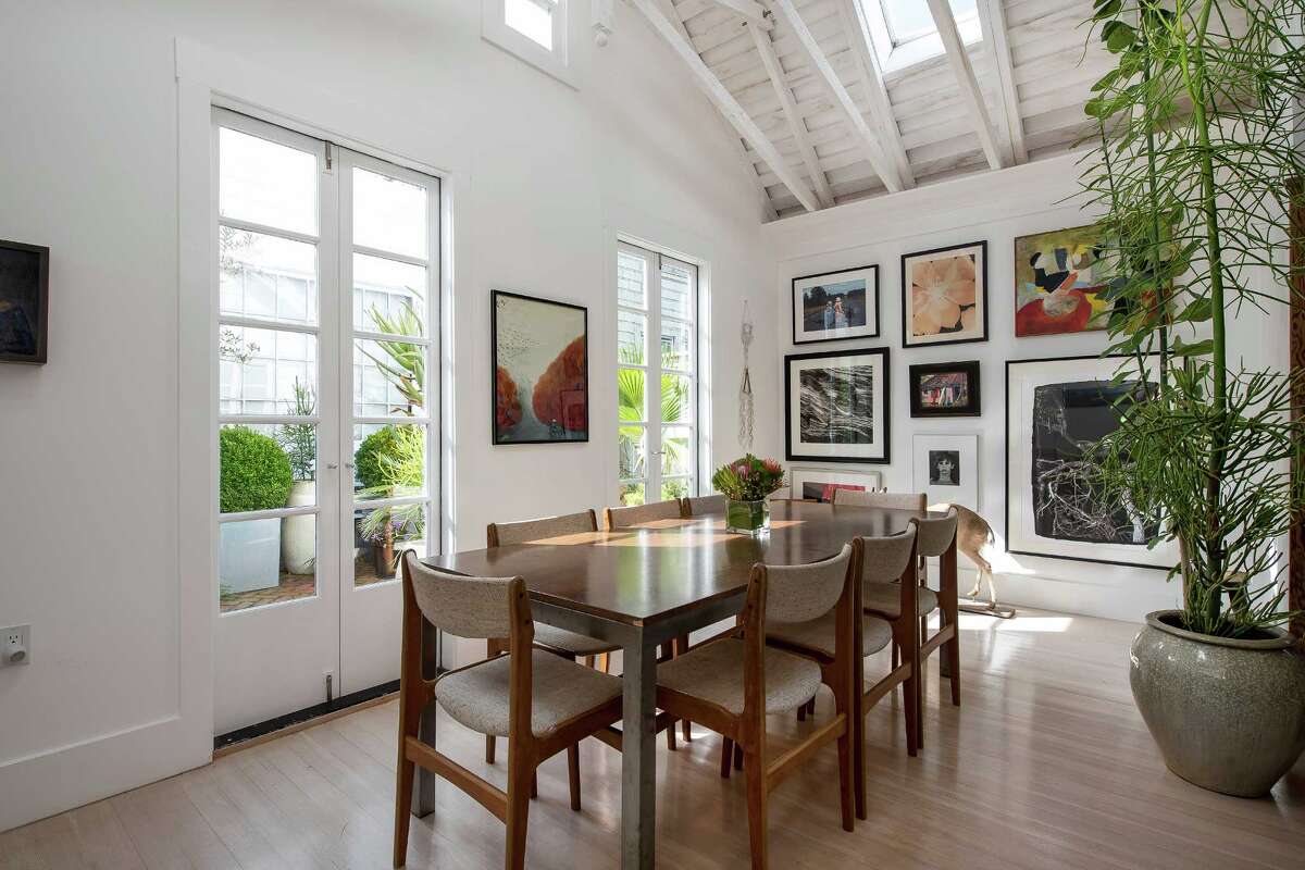 Double-height dining room highlights Excelsior cottage