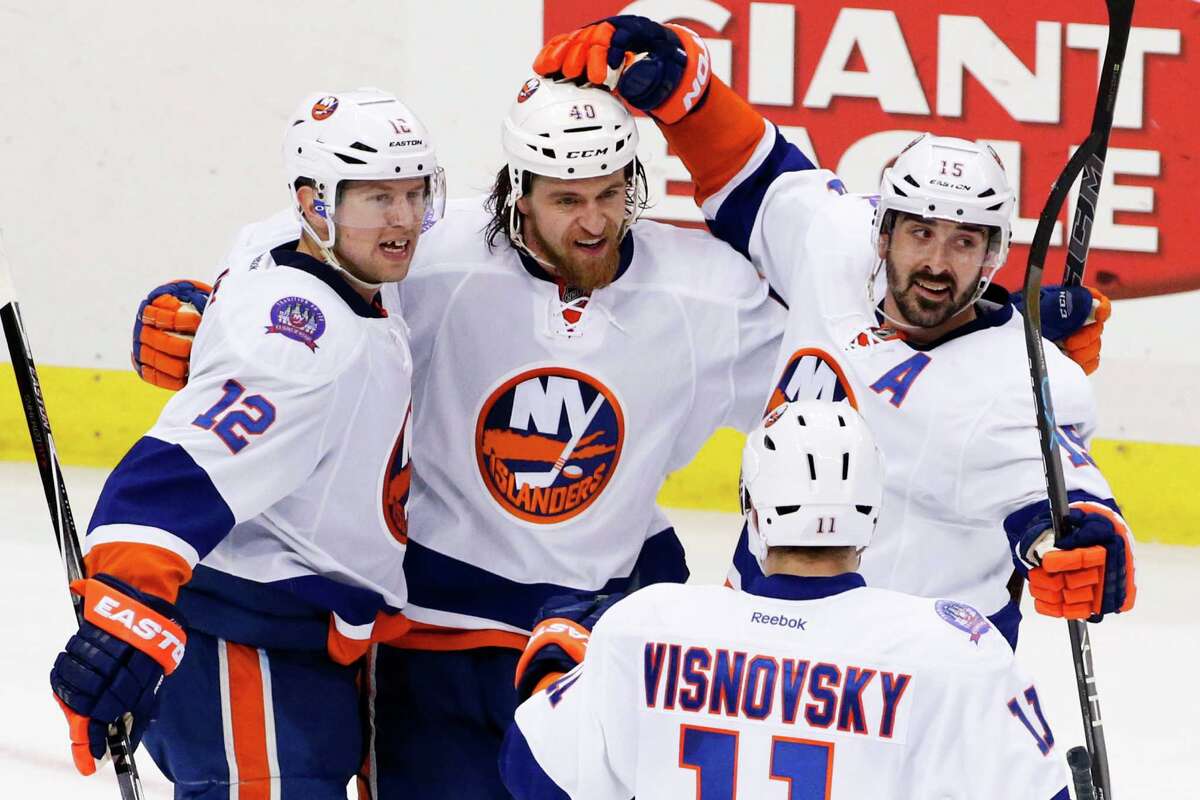 Isles top reeling Penguins