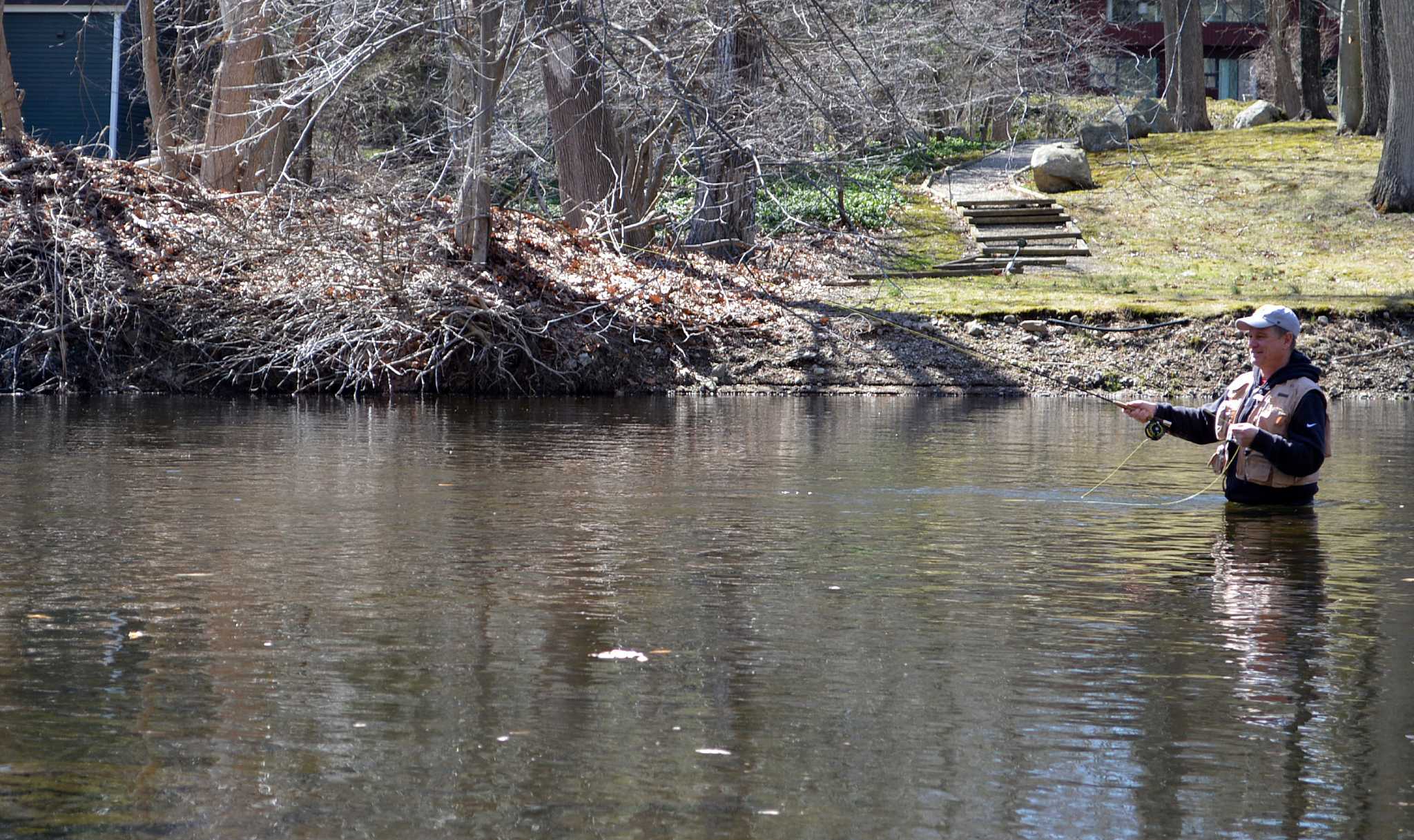 Go fish! Anglers spring into action as season begins along the Saugatuck