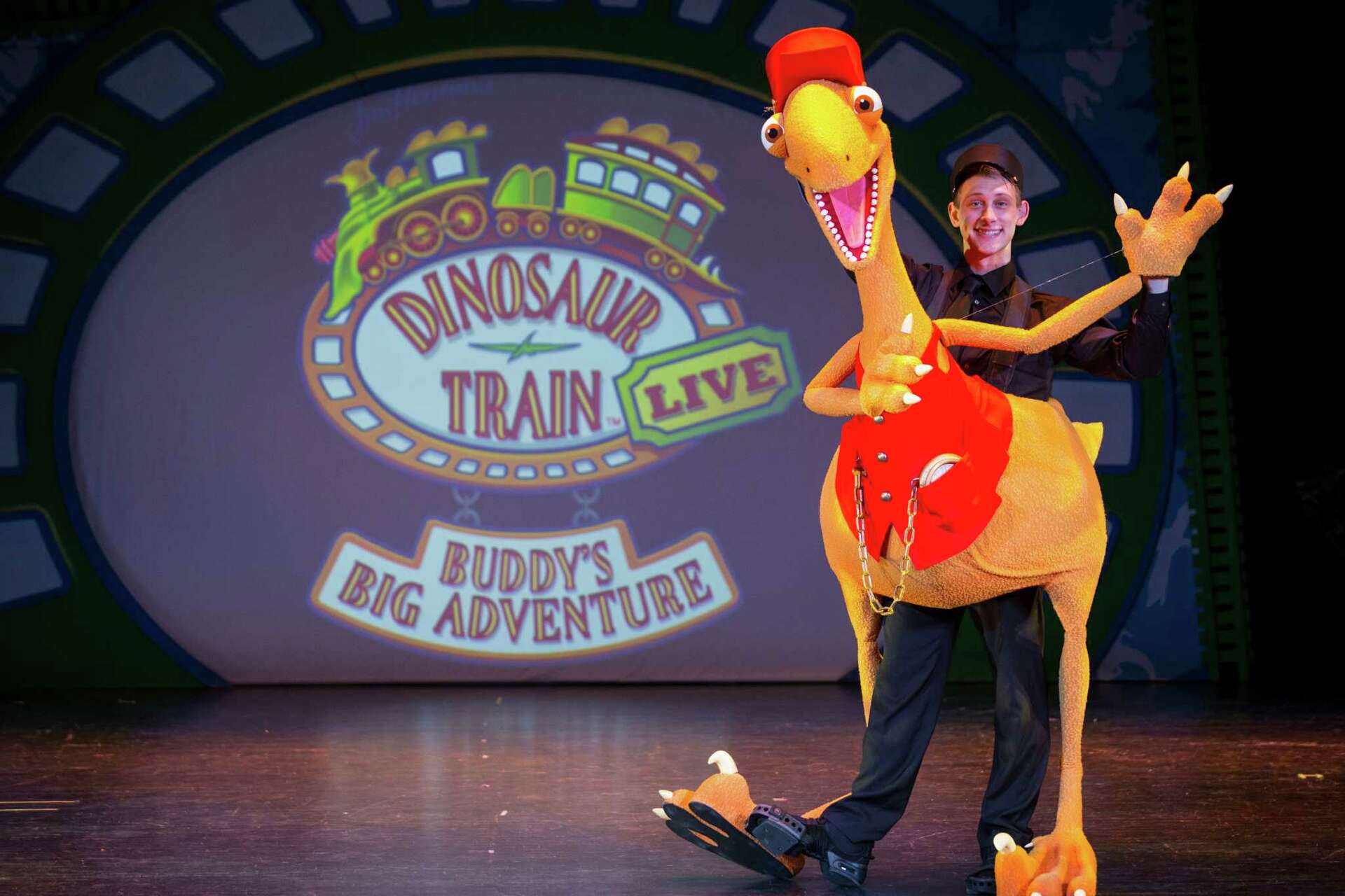 Conductor for 'Dinosaur Train' enjoying the ride