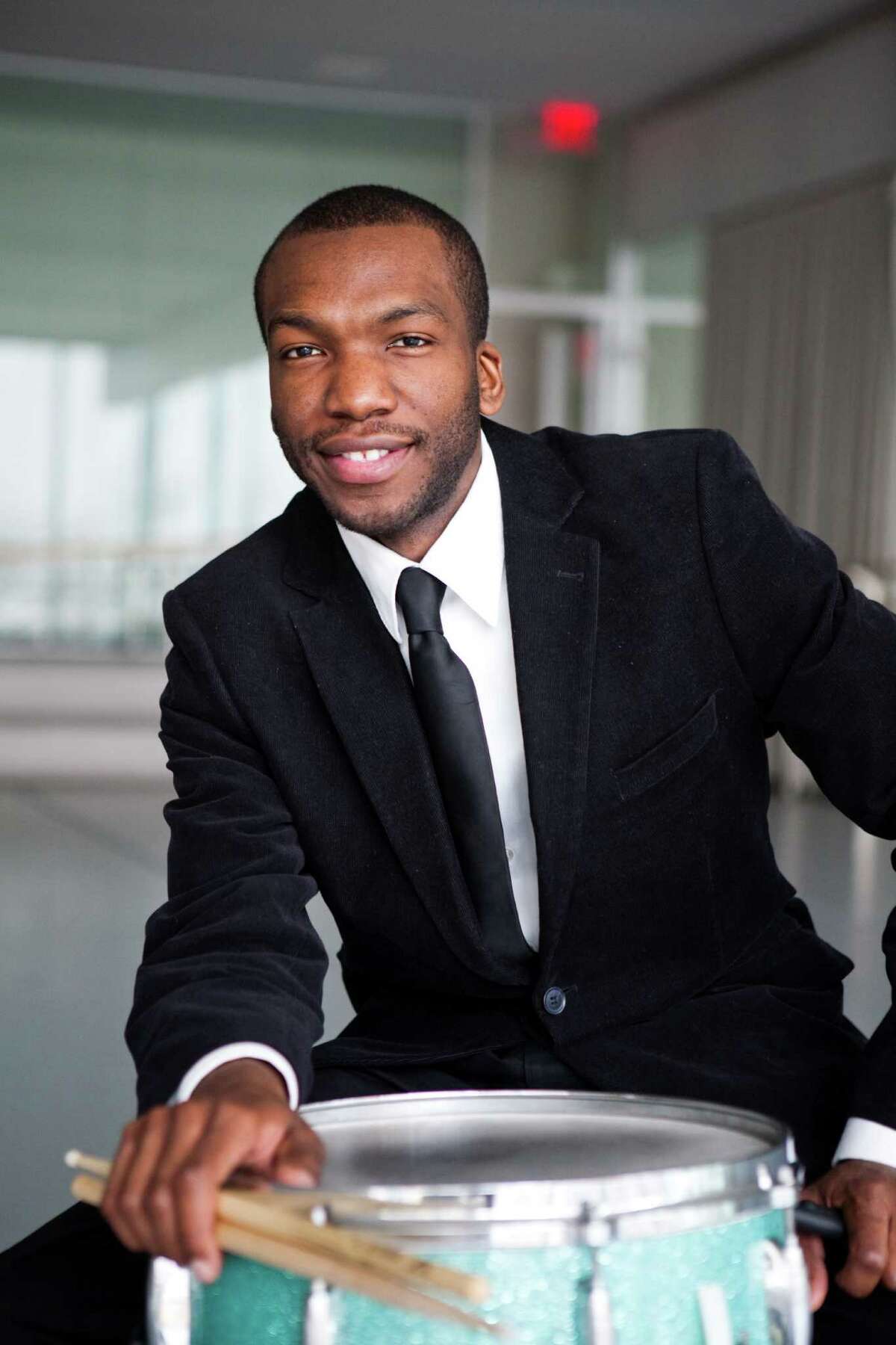 Reggie Quinerly finds balance in the drumbeat