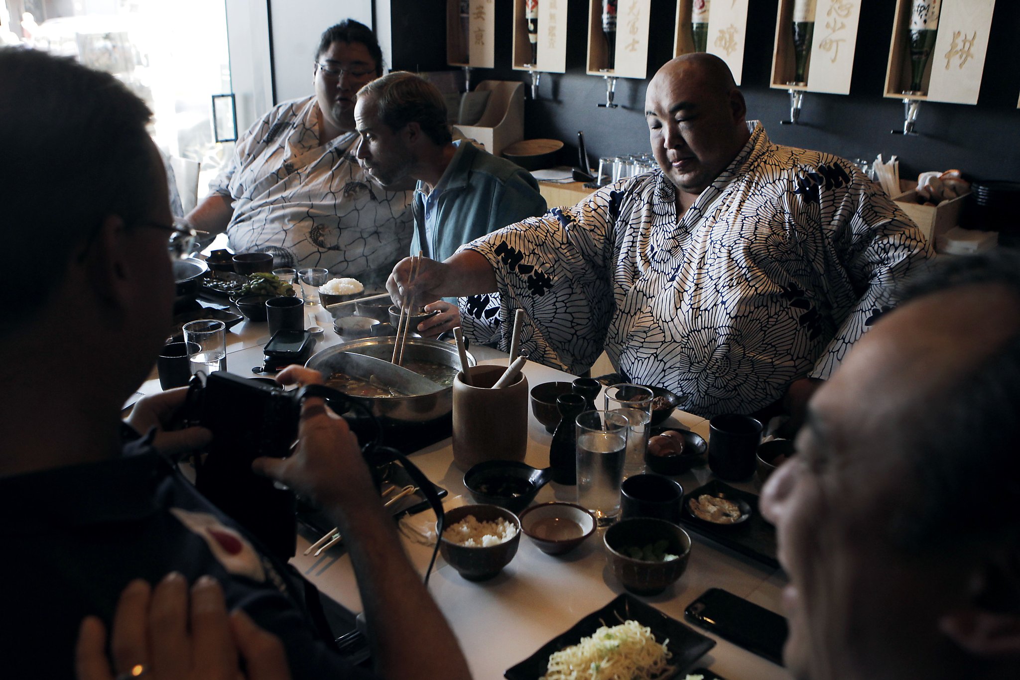 Grappling with what to ask 2 famous Japanese sumo wrestlers