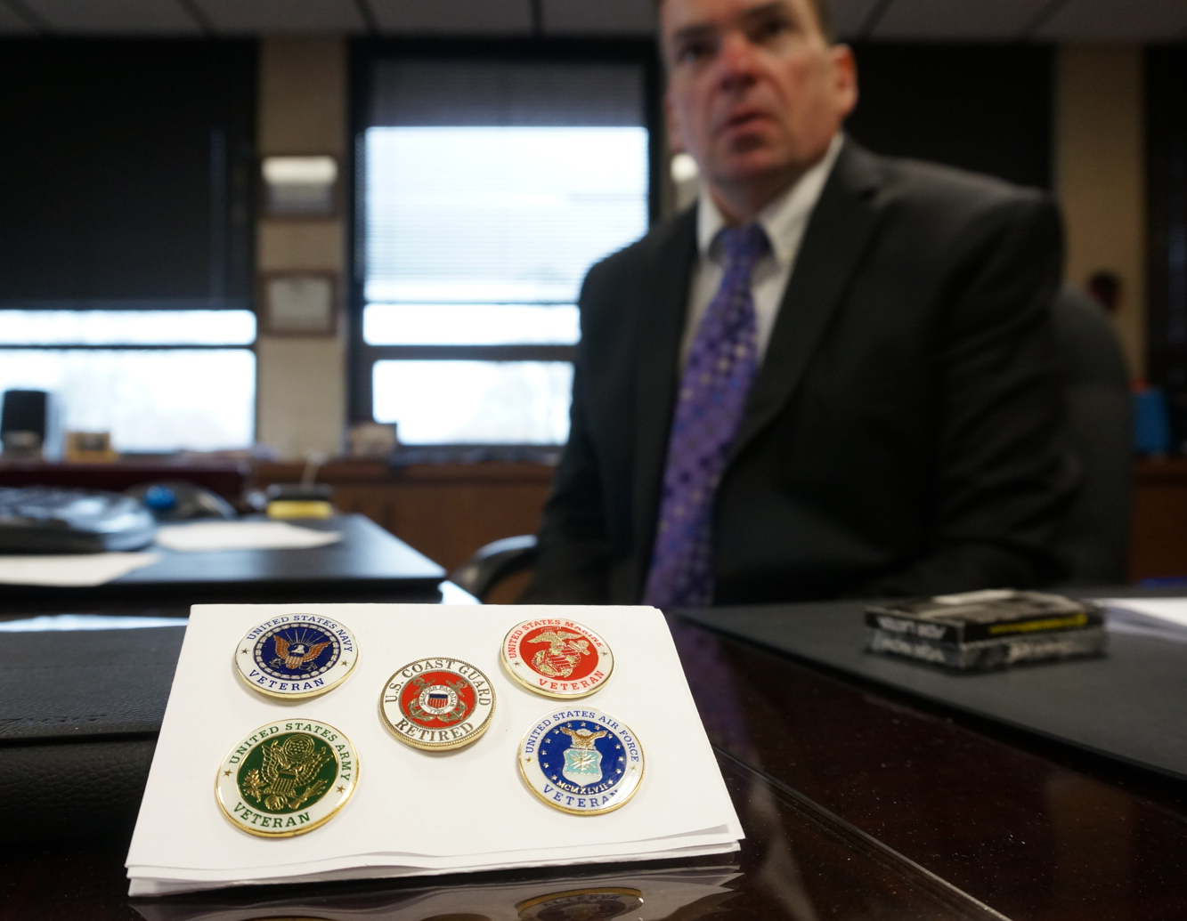 New pins salute police officers' military service