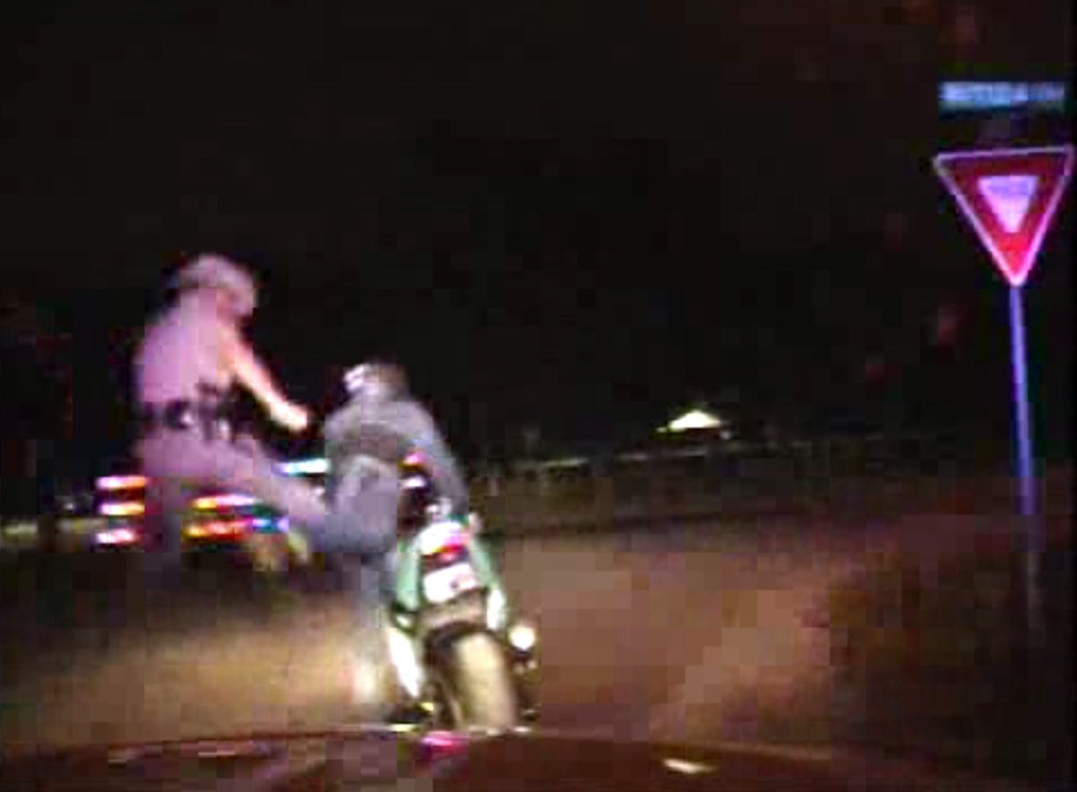 Video shows DPS trooper karate kick suspect off his motorcycle