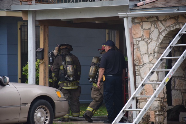 Woman without a pulse pulled from burning home by firefighters revived ...