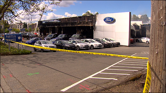 Crews battle stubborn fire at Bellevue Ford dealership