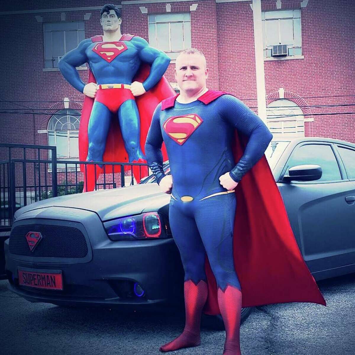 Dallas cop drives tricked-out Superman car to Illinois, surprises sick boy