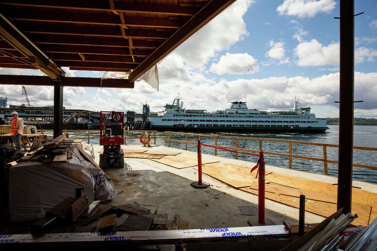 Seattle waterfront piers, original Ivar's, re-open for the summer