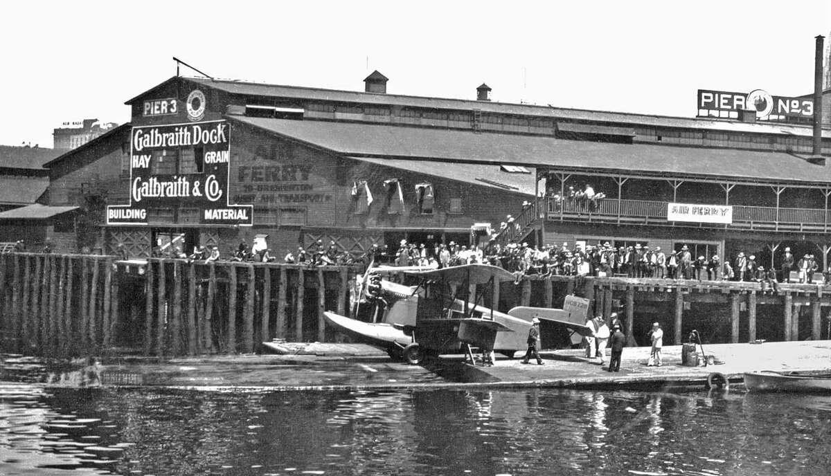 Seattle waterfront piers, original Ivar's, re-open for the summer