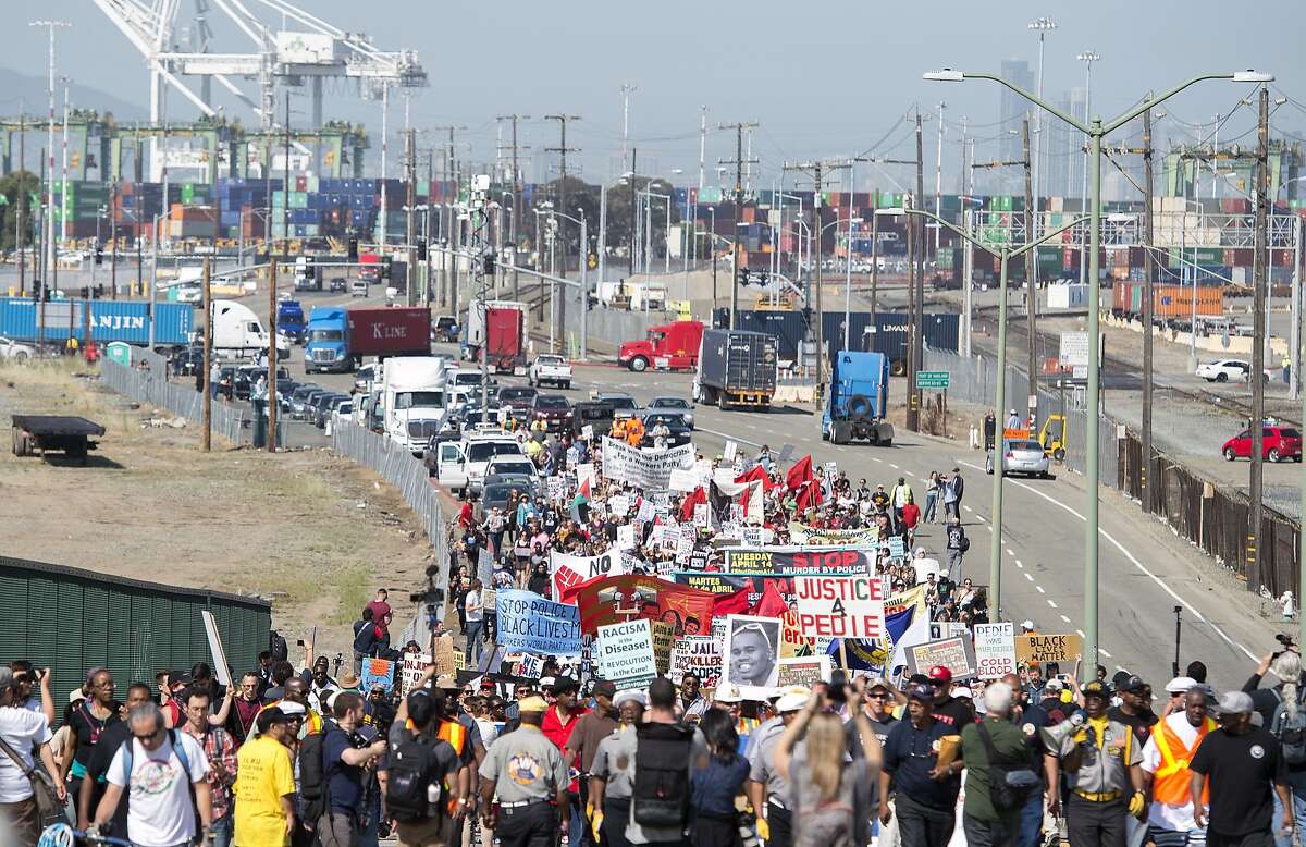 After peaceful day, protests grow rowdy at night in Oakland