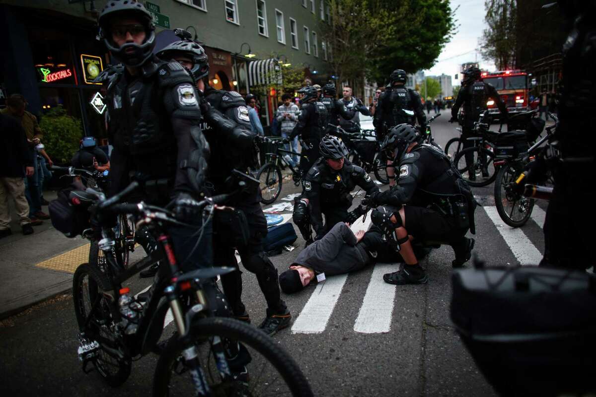 Cleanup begins on Capitol Hill after violent May Day protest