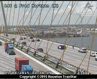 Man threatens to leap from Fred Hartman Bridge