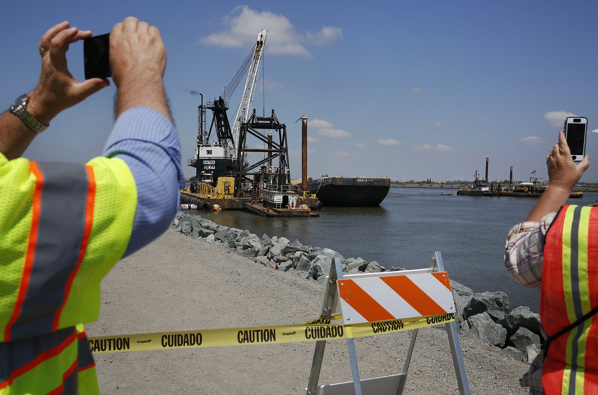State building rock barrier to protect delta from salt water