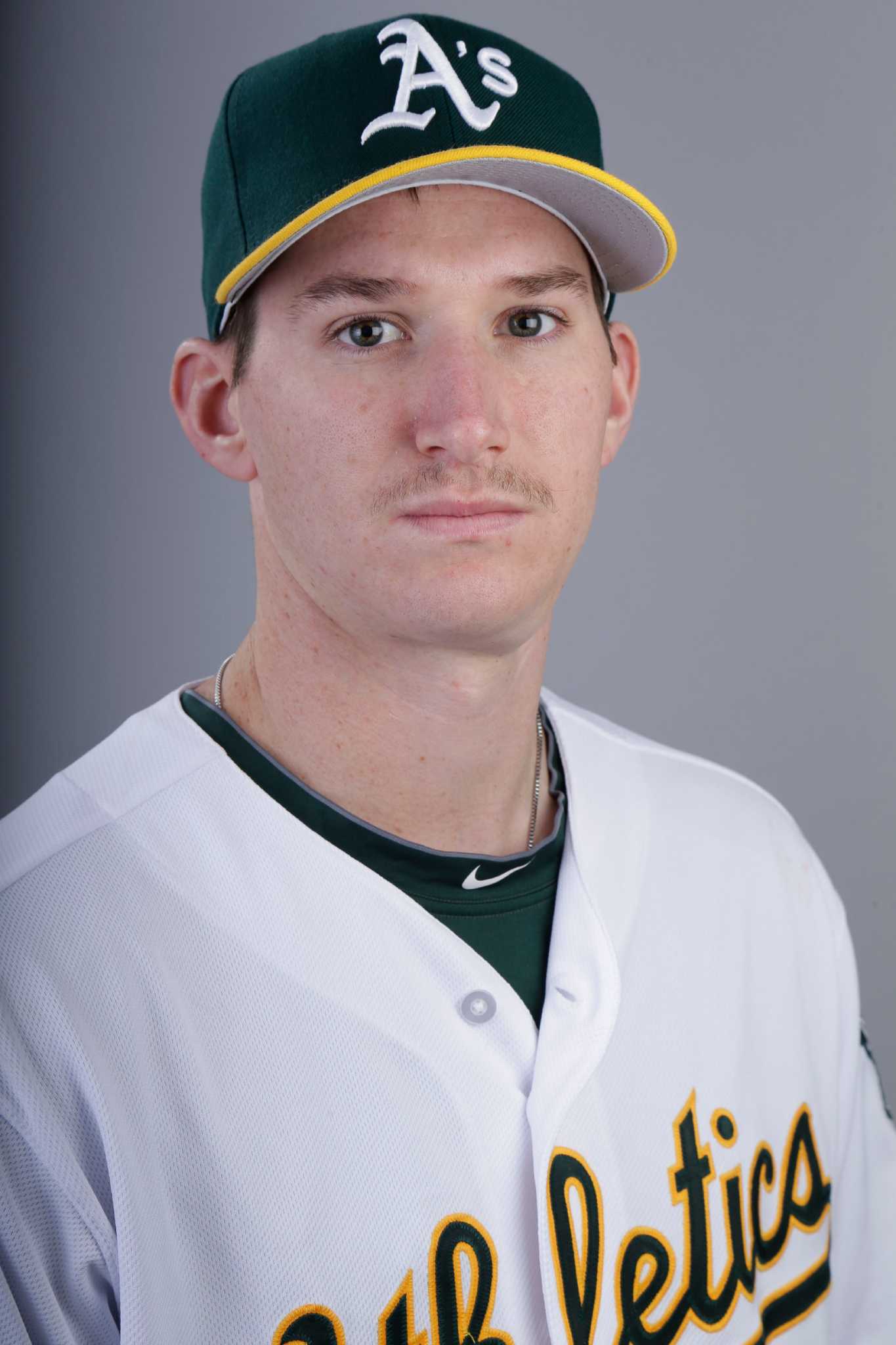 A’s Jarrod Parker has broken bone in elbow