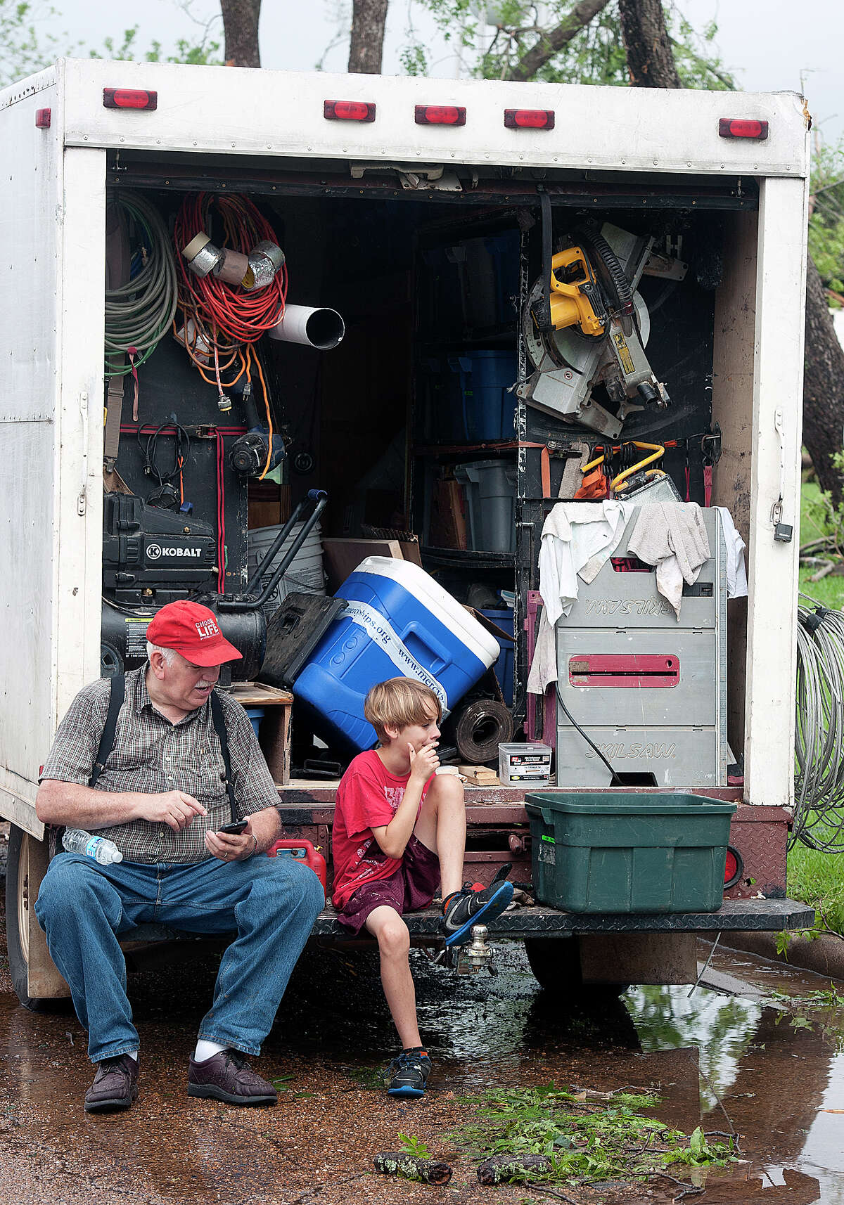 Retired police detective found dead with arm around dog after tornado