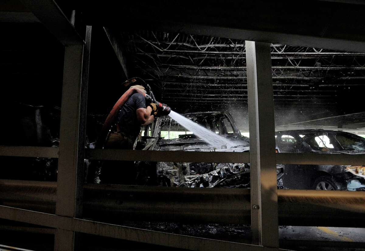 Cars burn in midtown parking garage; second garage fire in four days