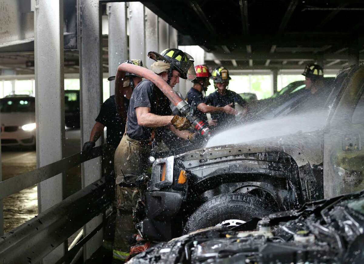 Cars burn in midtown parking garage; second garage fire in four days
