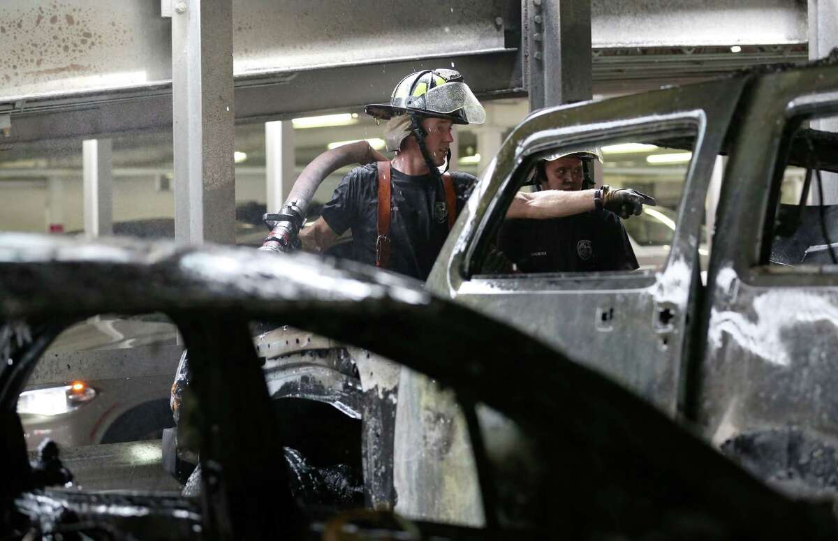 Cars burn in midtown parking garage; second garage fire in four days