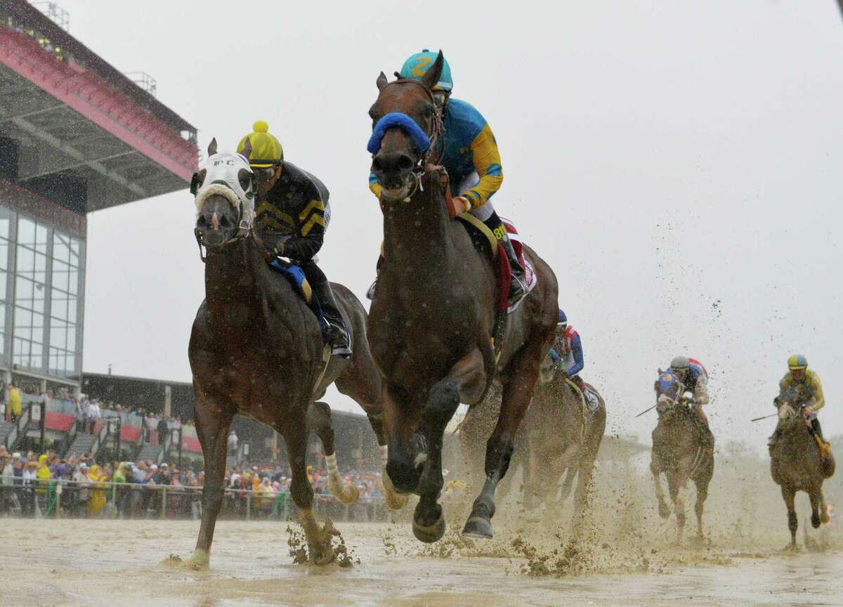 American Pharoah keeps alive Triple Crown hopes with Preakness win