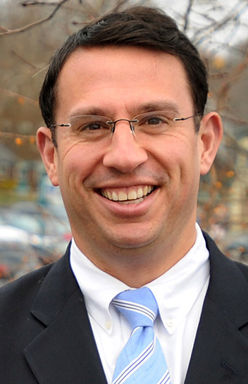 Amann turns up heat on Exit 33 opposition