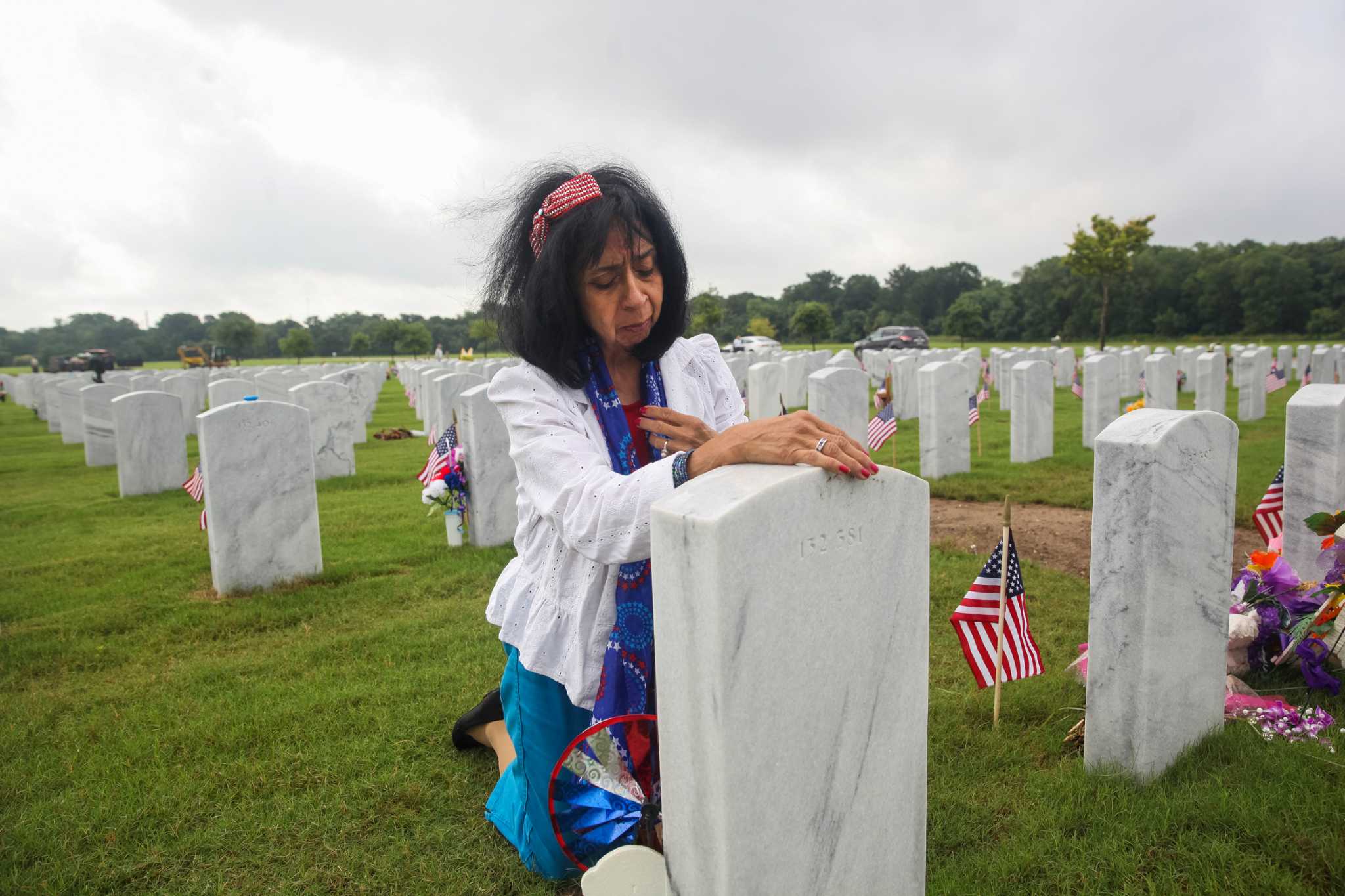 Veterans salute the dead at Fort Sam