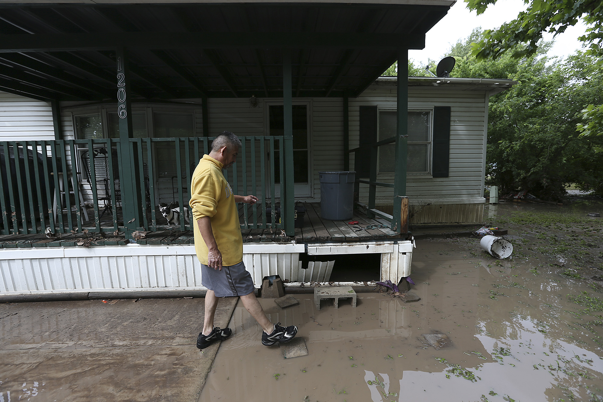 Search continues for 12 missing after flooding