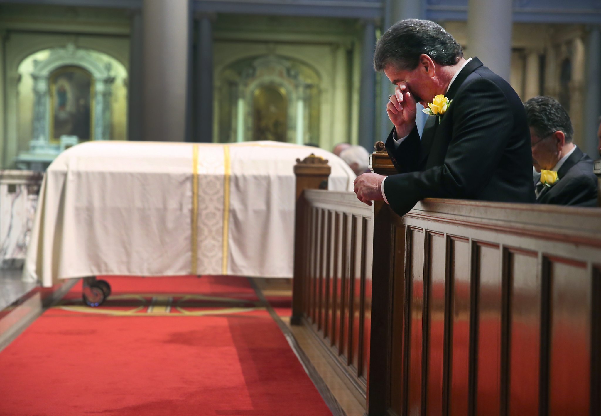 USF bids fond farewell to Father John Lo Schiavo