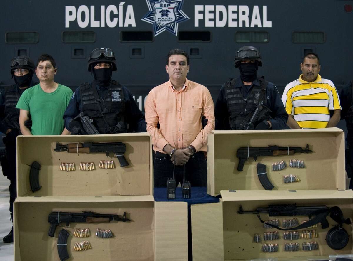 Alleged Mexican cartel hit man wanted in 20 killings arrested after gun ...