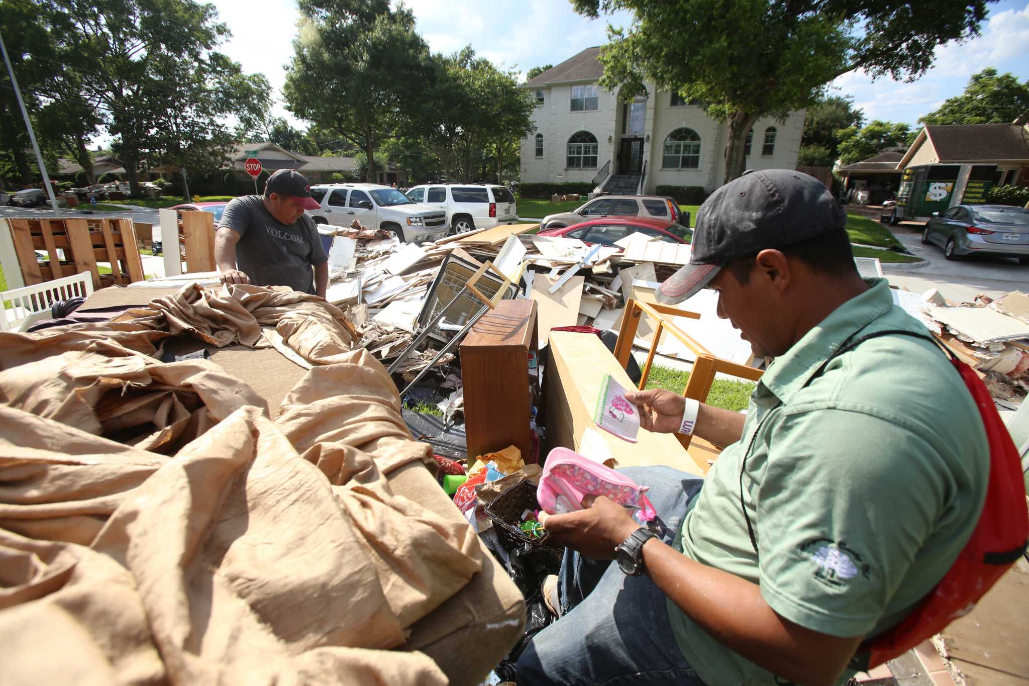 City, volunteer groups collaborate on flood recovery for first time