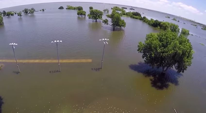 Drone video shows Texas golf course still a swamp a week after floods