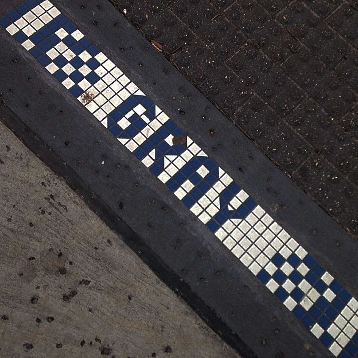 Houston man on a mission to document the city's vintage curb tiles