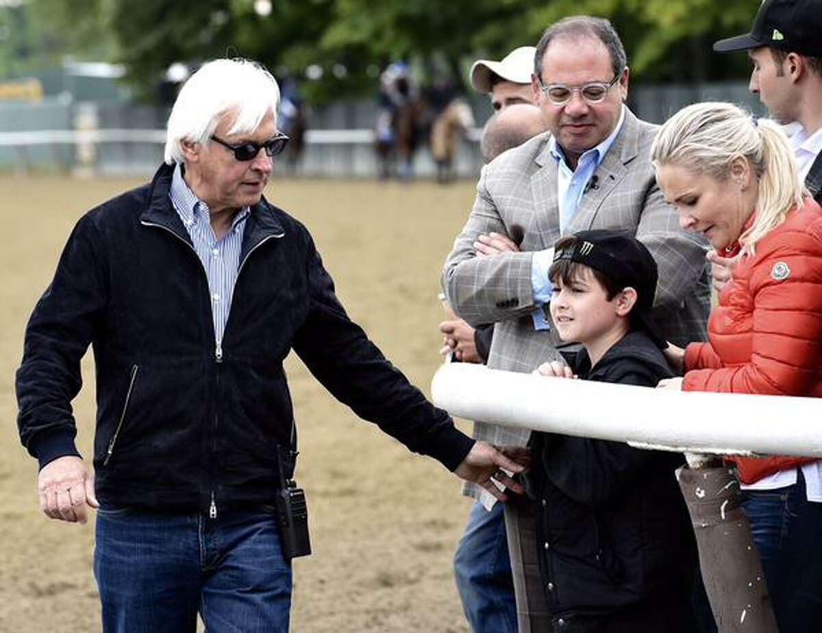 American Pharoah rules at Belmont, winning Triple Crown