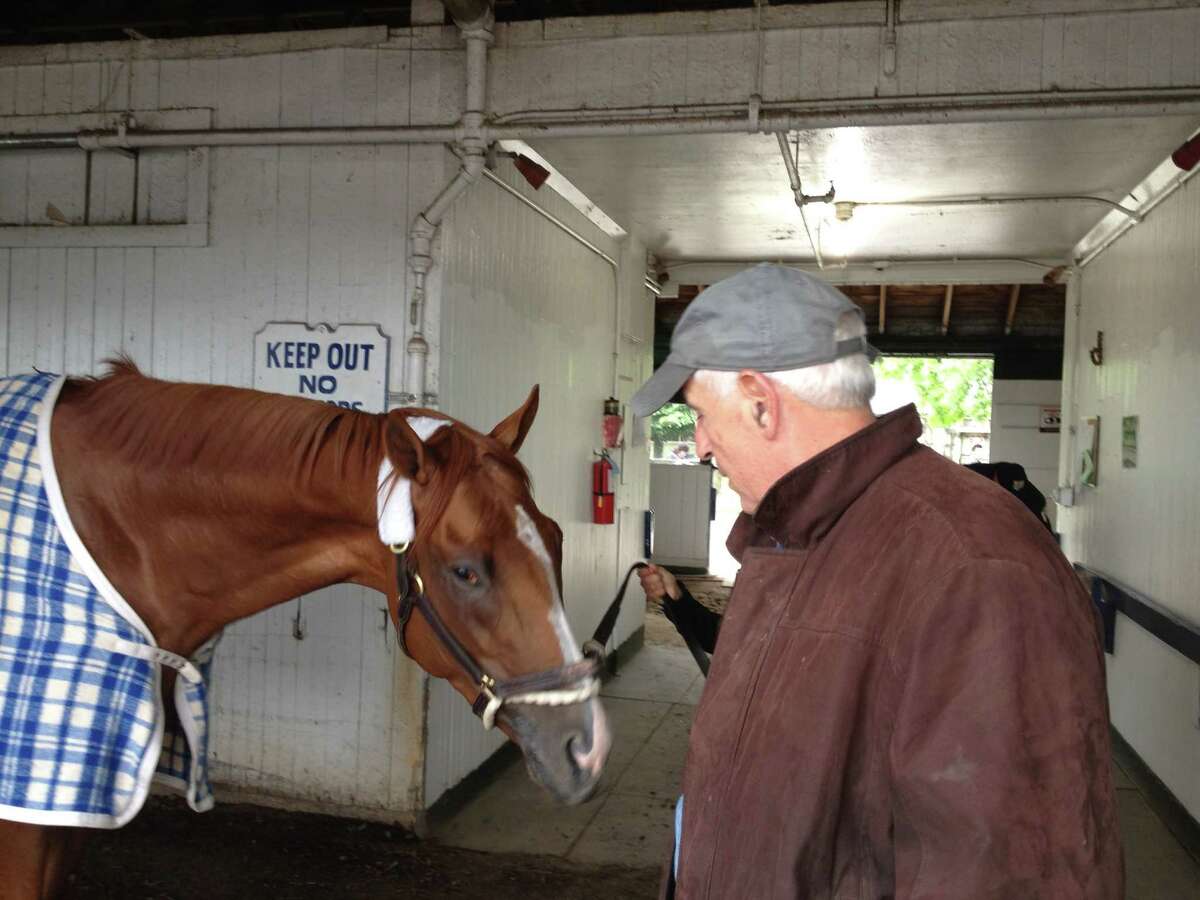 American Pharoah rules at Belmont, winning Triple Crown