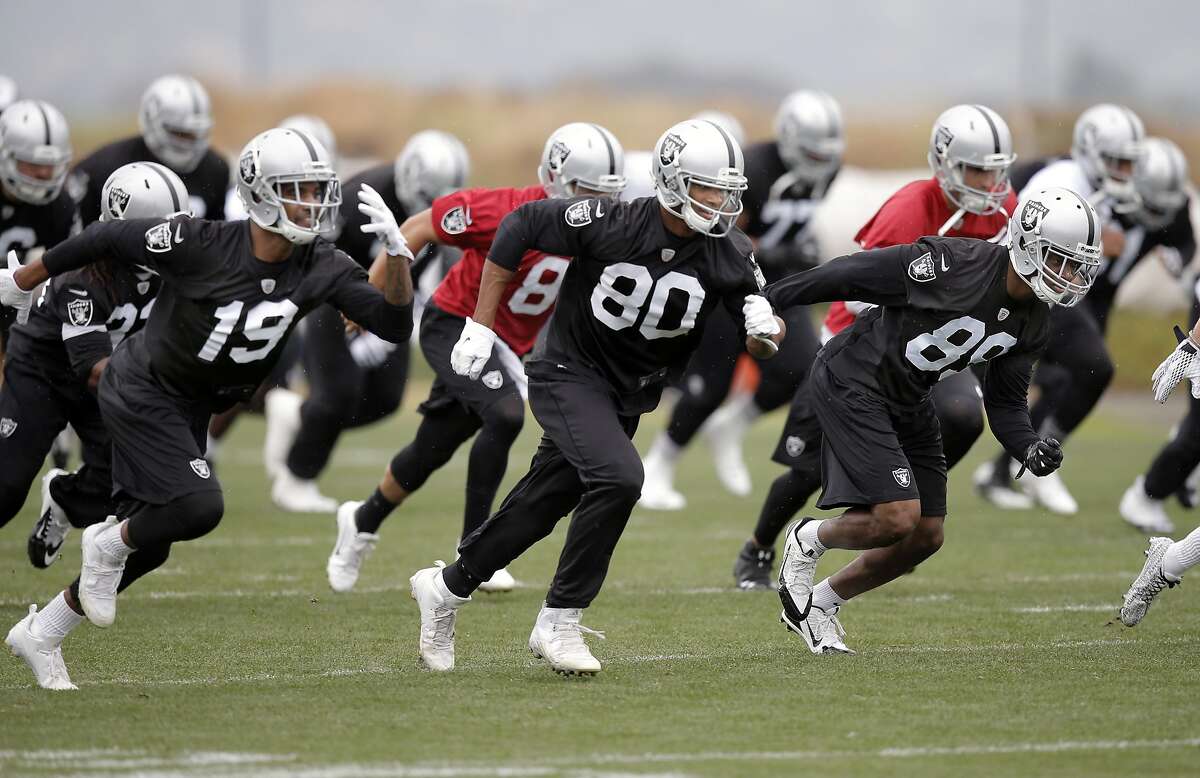 Just grin, baby: Classic Raiders training camp photos, 1960-2015