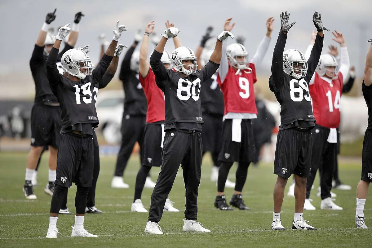 Just grin, baby: Classic Raiders training camp photos, 1960-2015