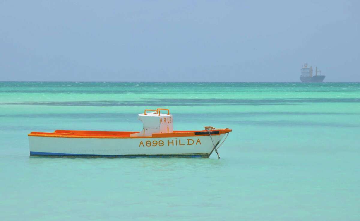 Explore the happy island of Aruba by boat, Jeep and horse