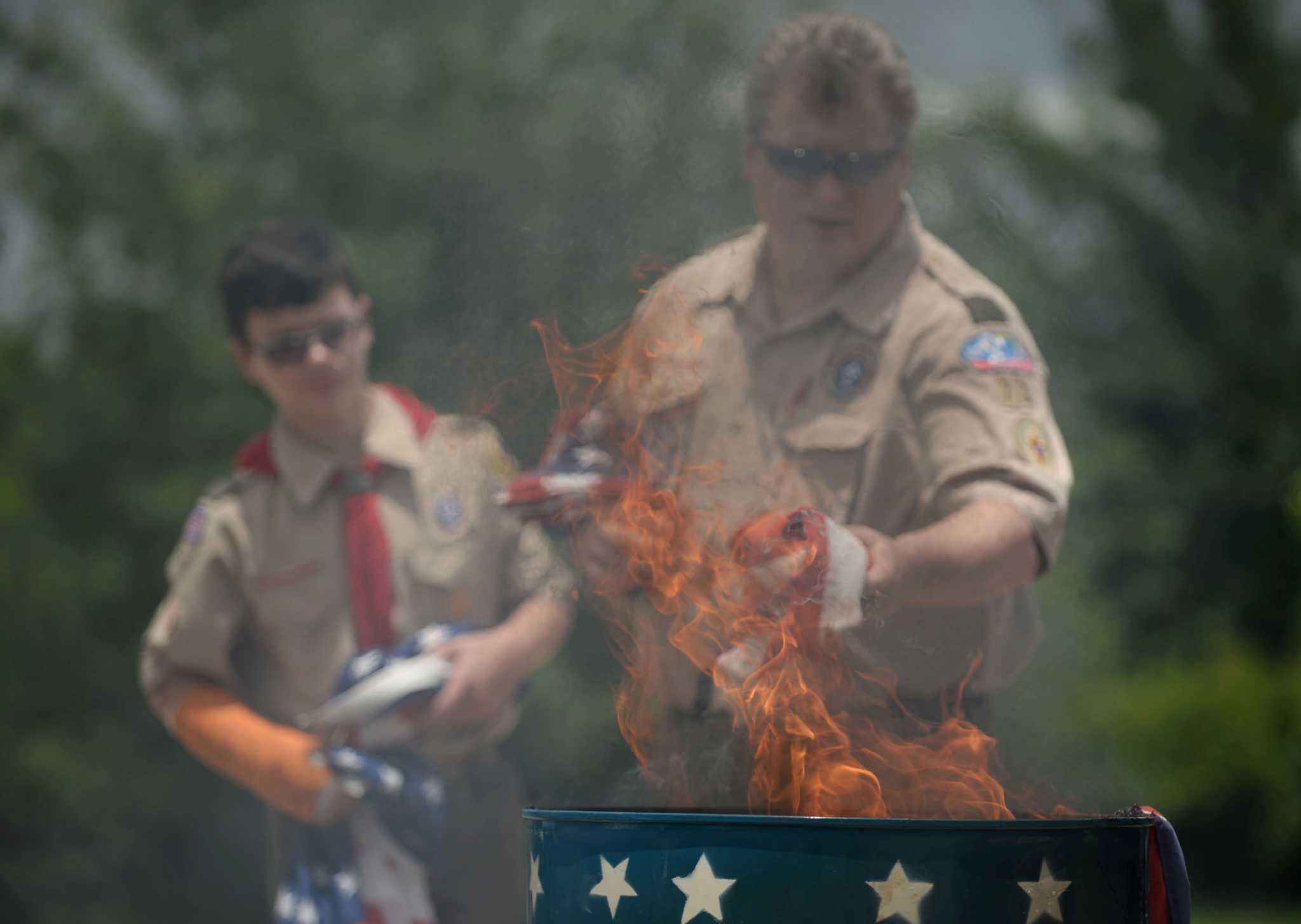 American flags set on fire to honor history