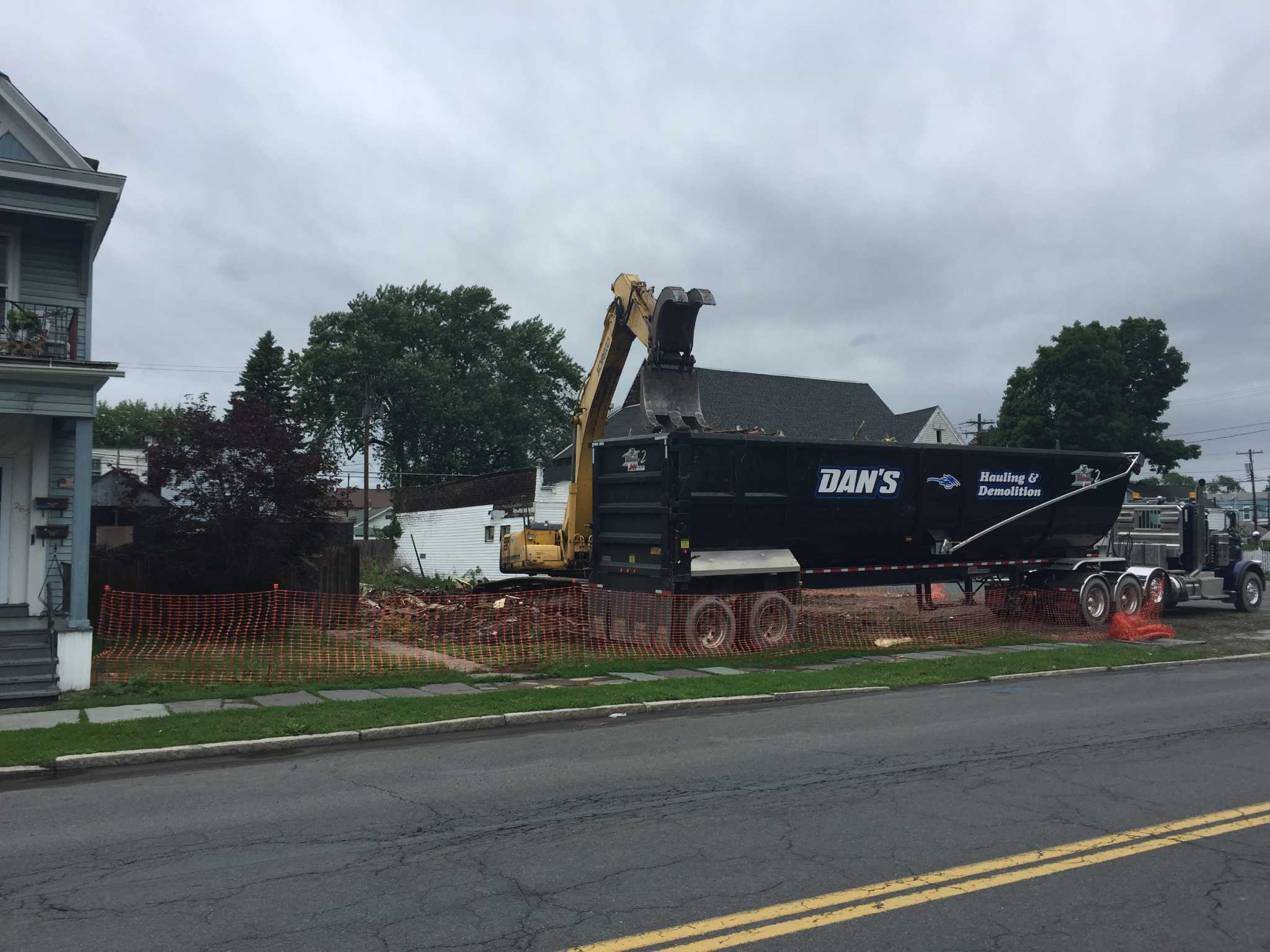 Burned-out building razed in Troy