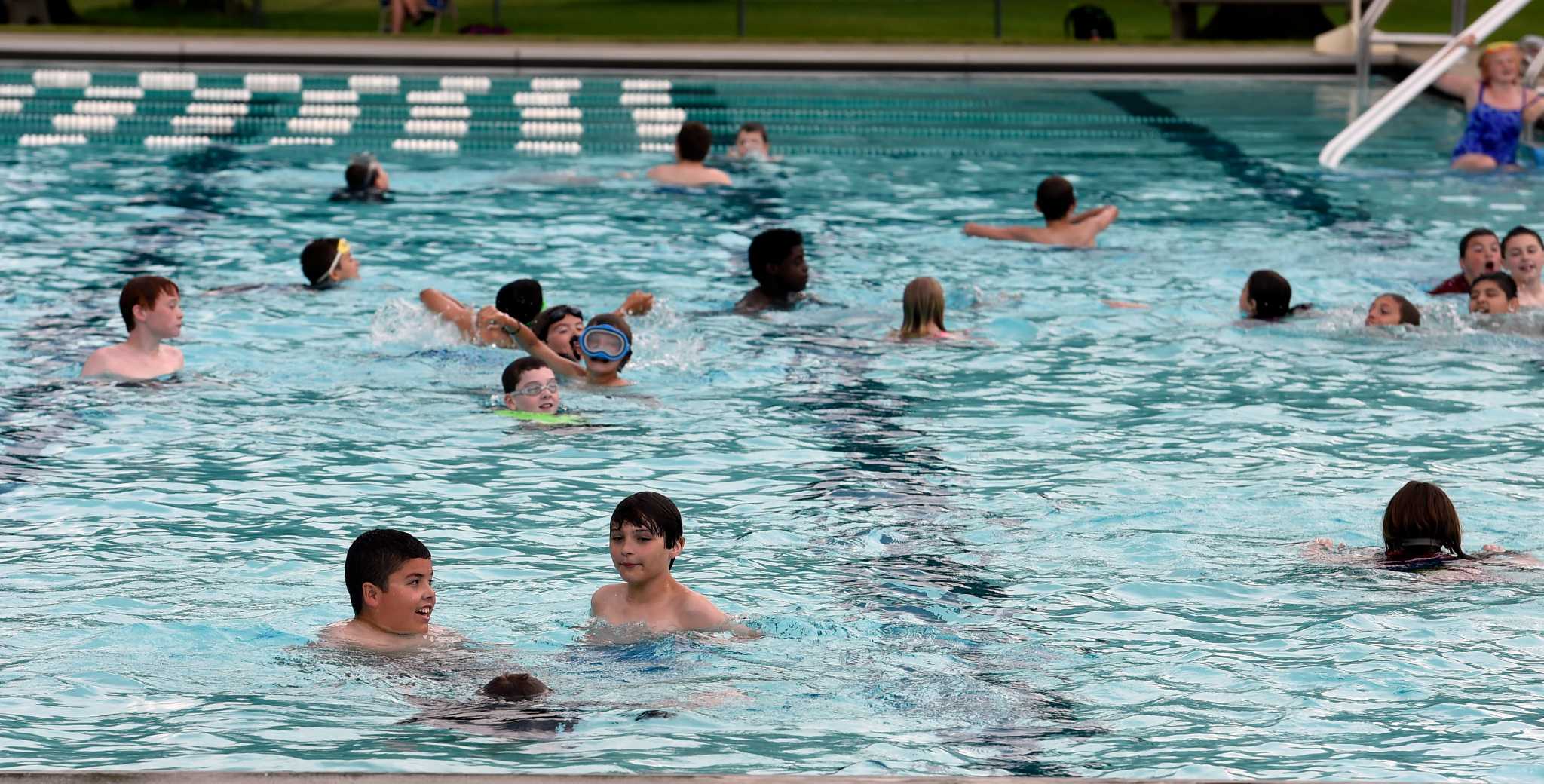 Towns open cooling centers, extend pool hours to beat the heat