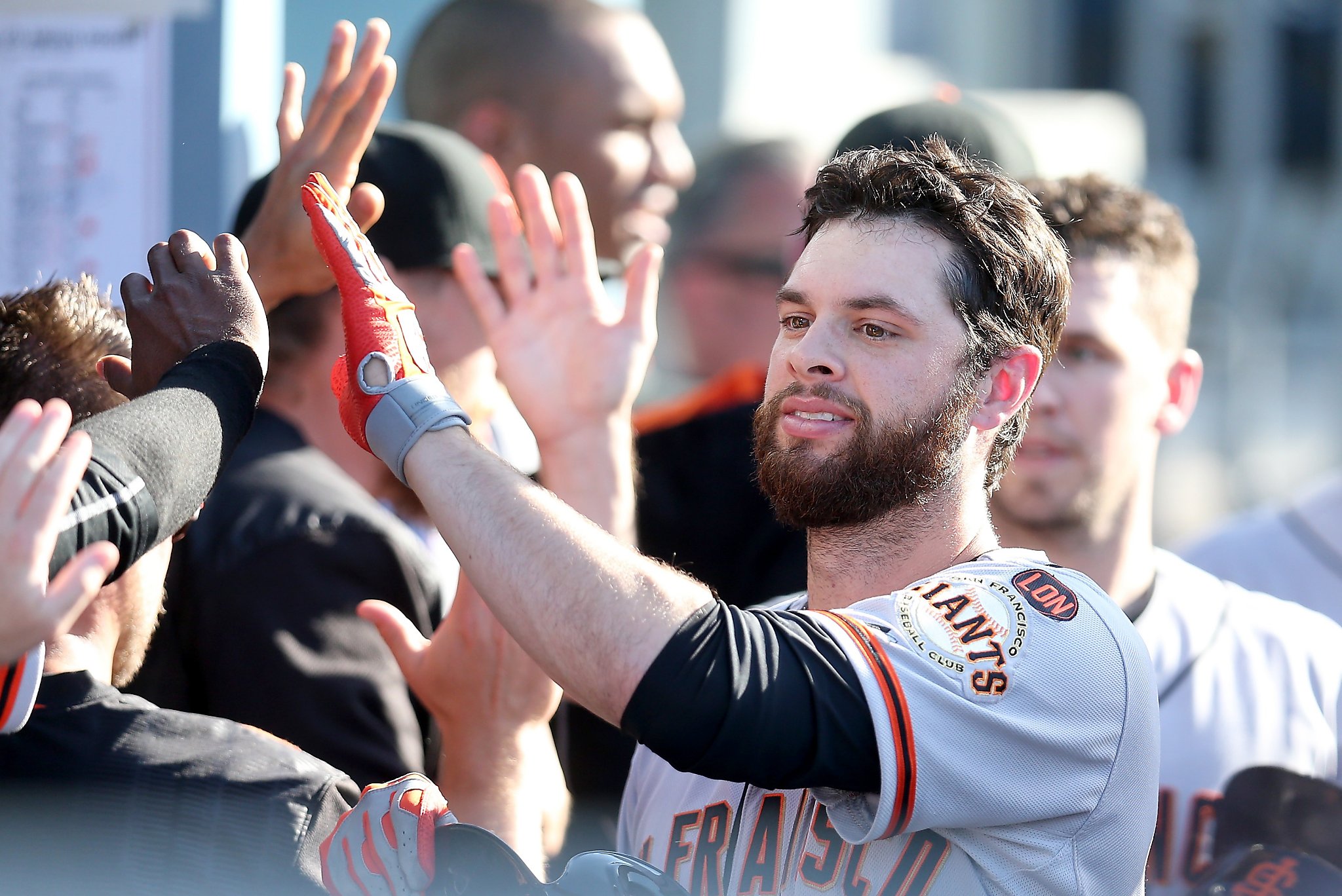 Names and faces: Brandon Belt, Lisa Borders
