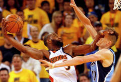 Check out Steve Kerr hitting an underhanded half-court shot