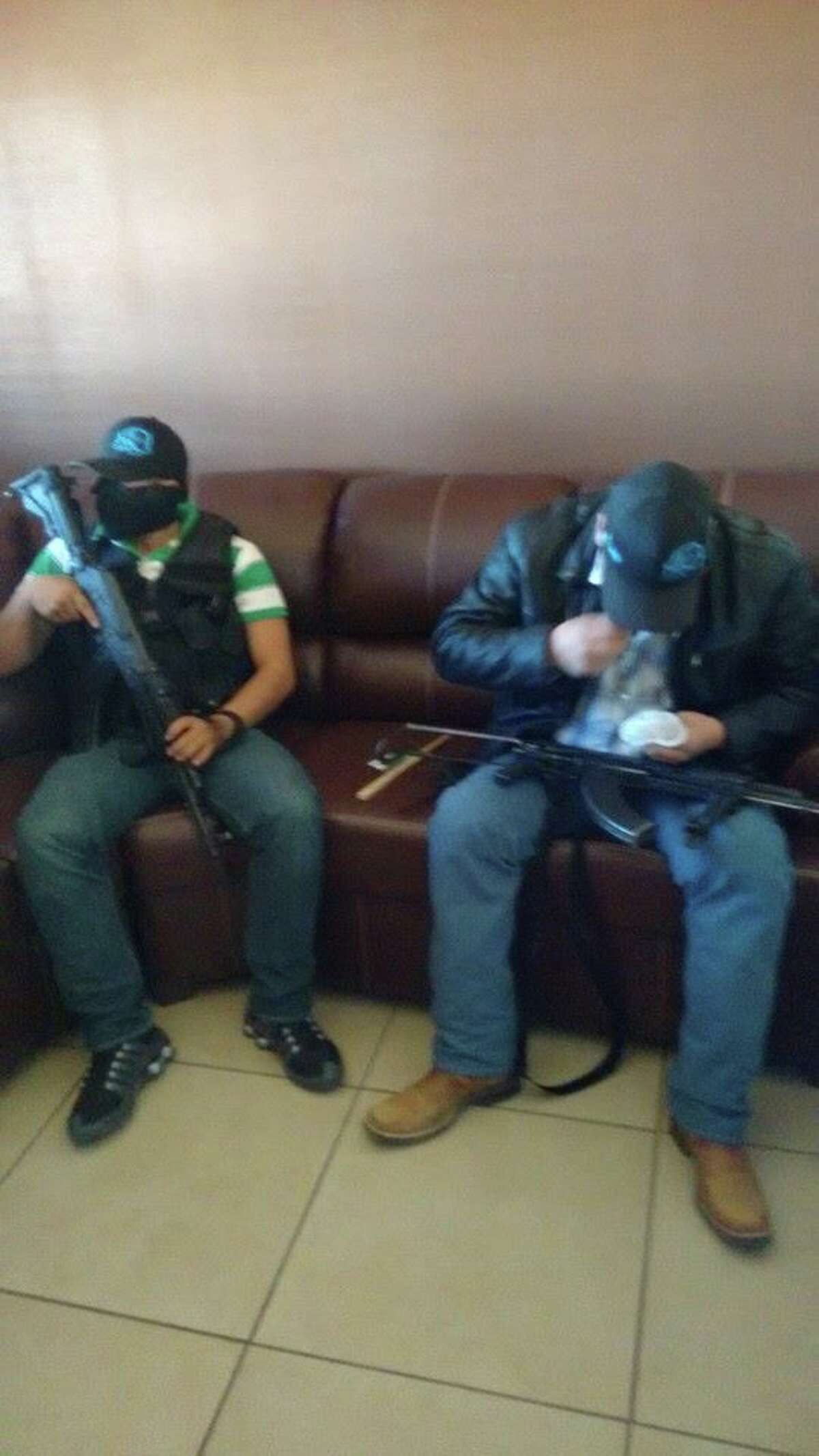 Leaked video claims to show young Mexican drug cartel assassins holding ...