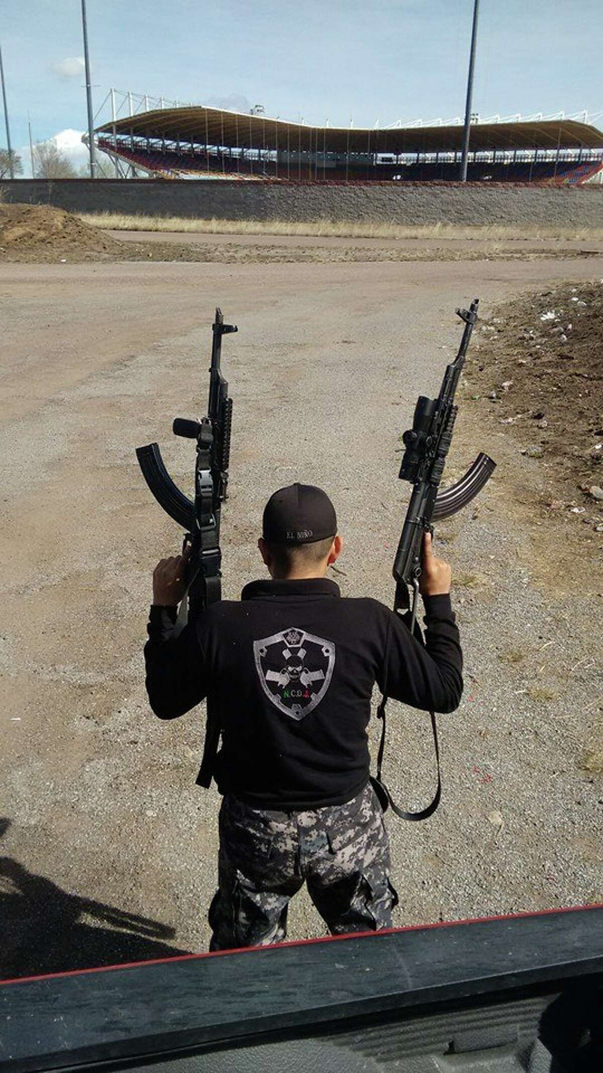 Leaked video claims to show young Mexican drug cartel assassins holding ...