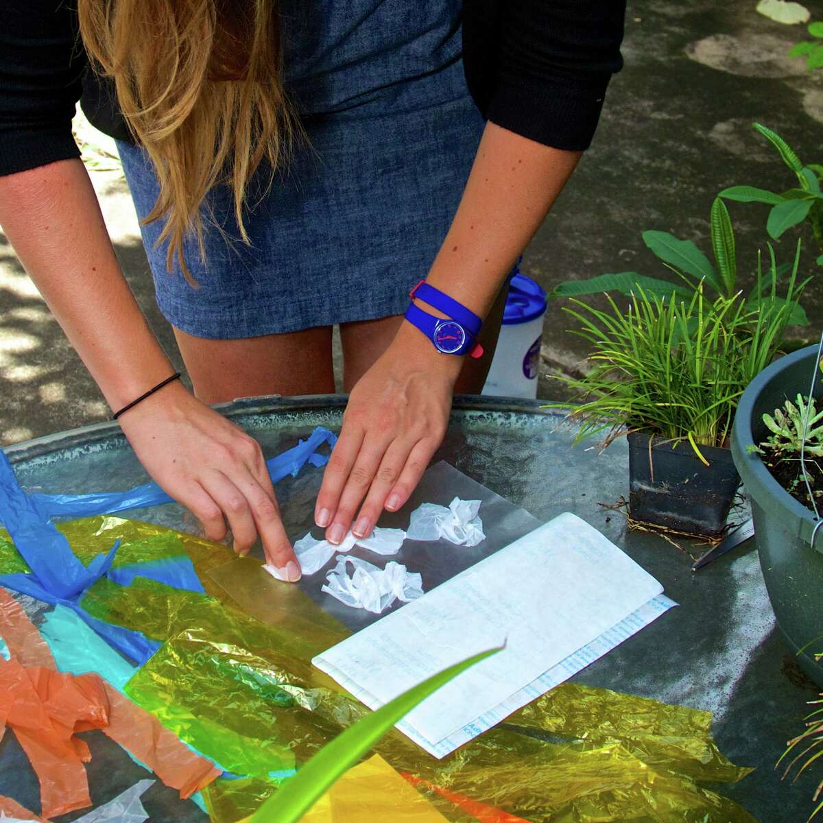 Make a collage with recycled plastic bags