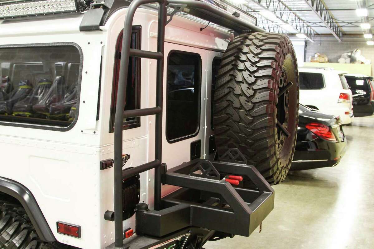 This decked out armored Hummer has shocking door handles, satellite TV ...